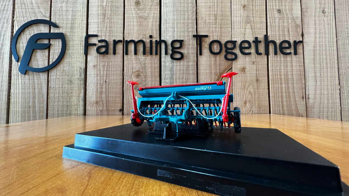 Semoir miniature Sulky Master bleu et rouge – Farming Together