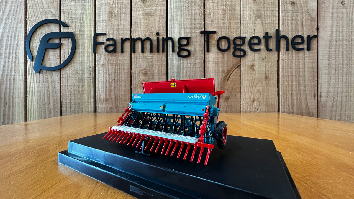 Semoir miniature Sulky Master bleu et rouge – Farming Together